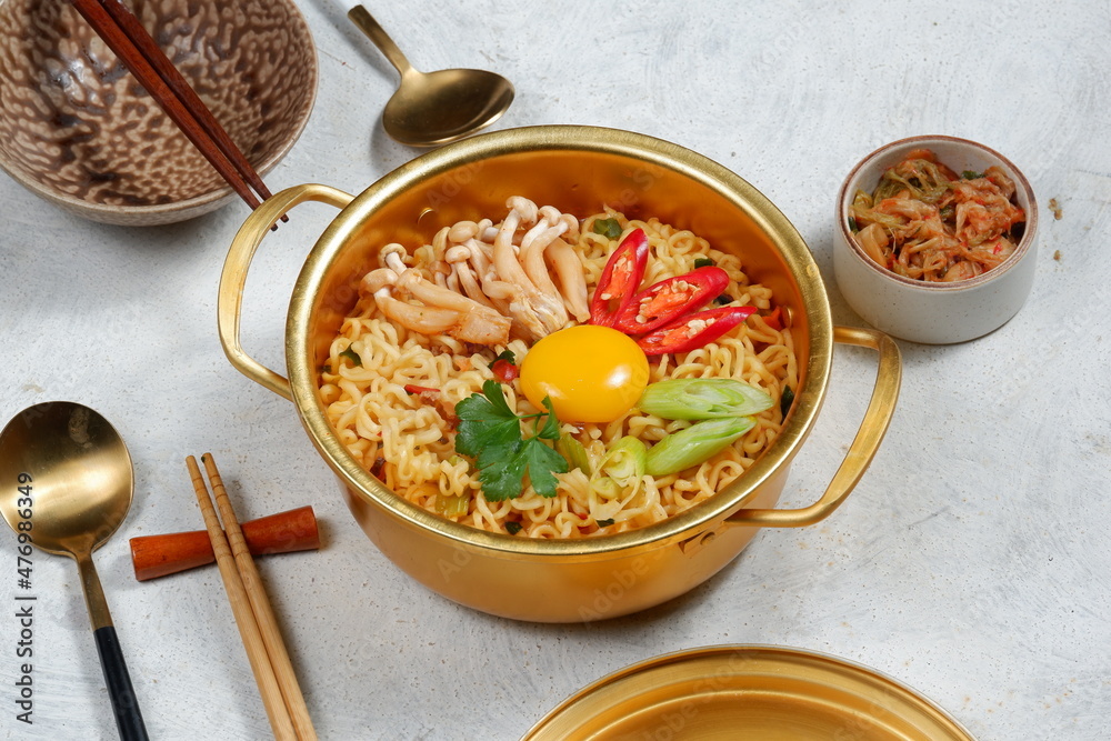 Serving a Korean style instant noodle, Ramyeon or Ramyun with spicy ...