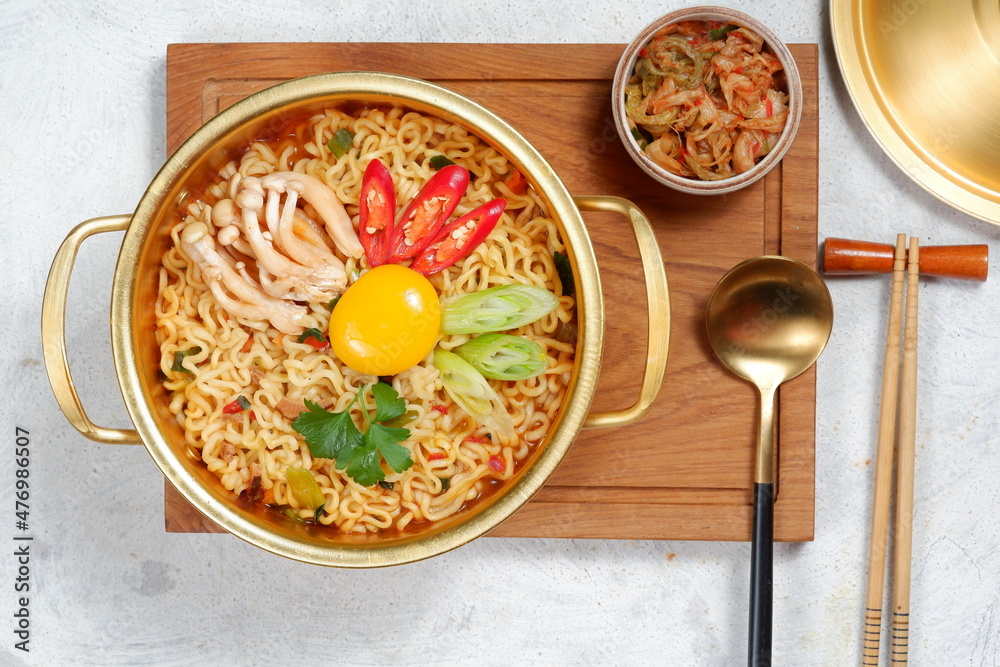 Serving a Korean style instant noodle, Ramyeon or Ramyun with spicy ...