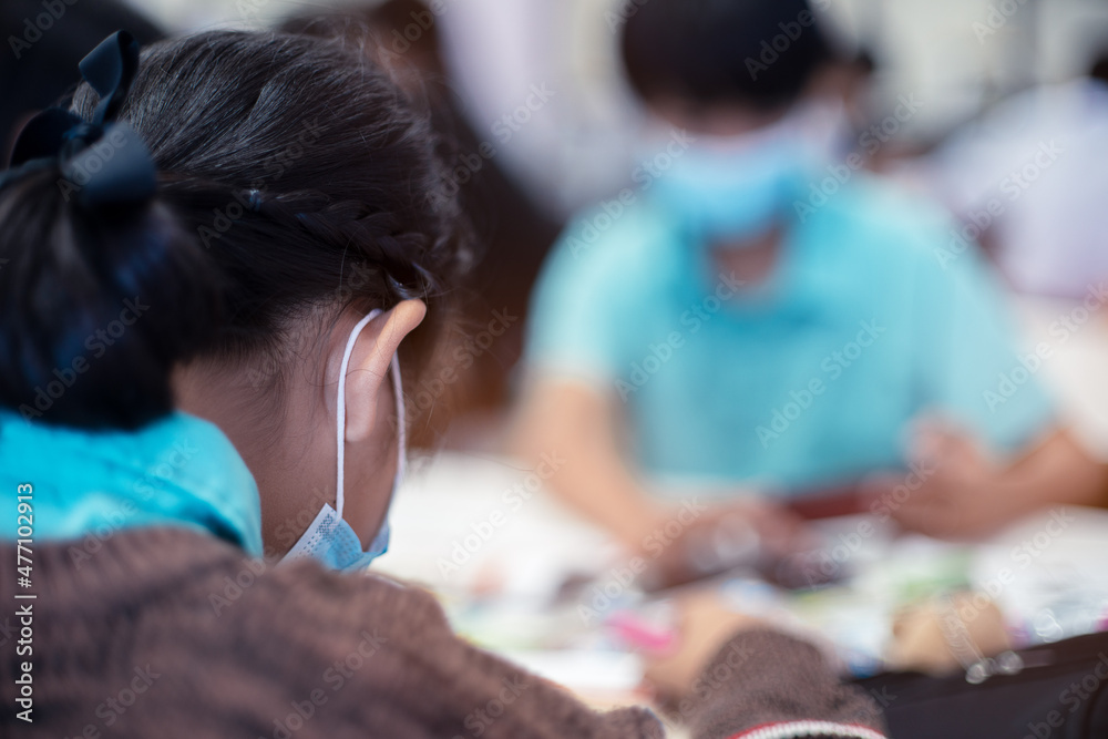Students are studying in a classroom after lockdown with everyone ...