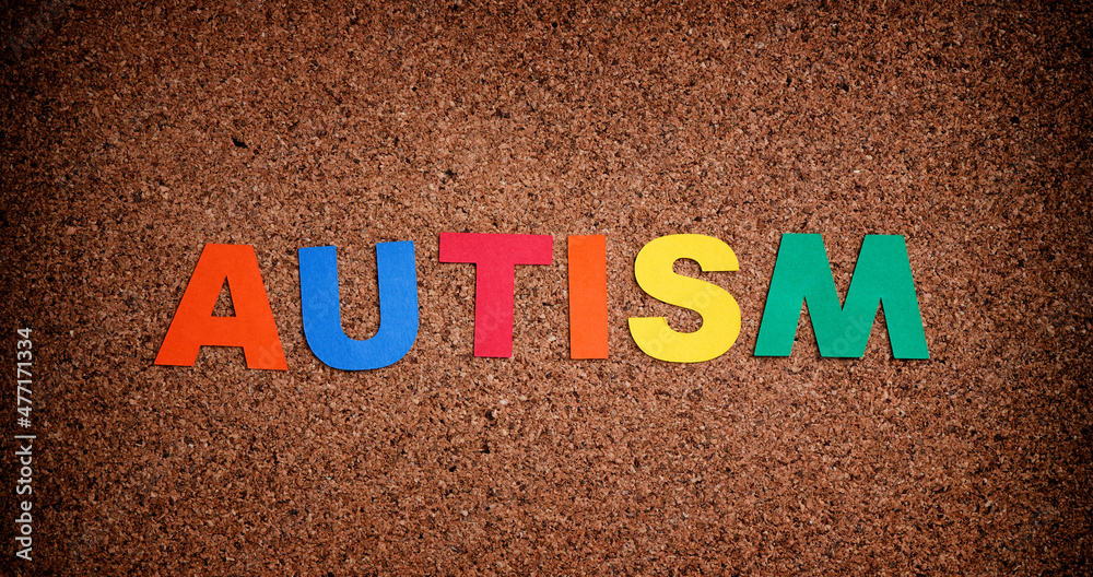 Autism. Autism spectrum disorder. Autism word made out of cardstock ...