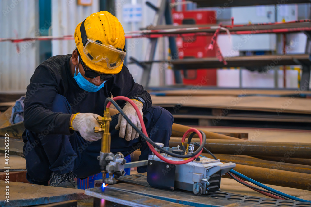 Portable automated gas cutting system. The operator controls the ...