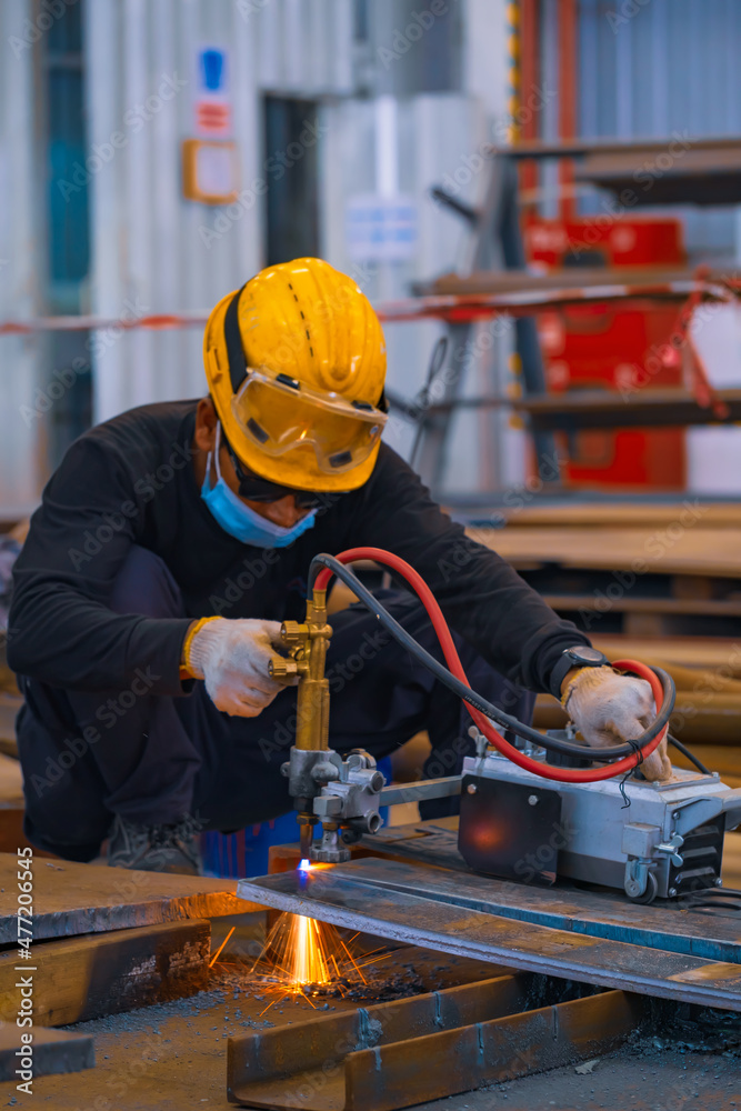 Portable automated gas cutting system. The operator controls the ...