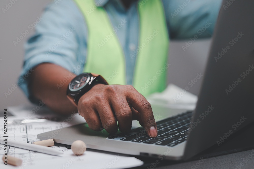 Engineer planning to work with data Through a laptop with an ...