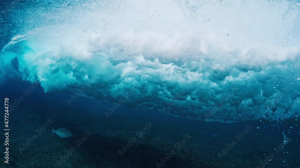 Ocean wave. Powerful clear ocean wave rolls and breaks on the surf spot ...