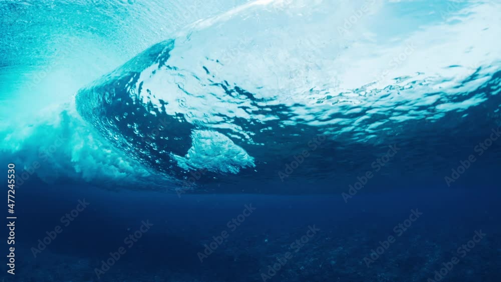 Ocean wave. Powerful clear ocean wave rolls and breaks on the surf spot ...