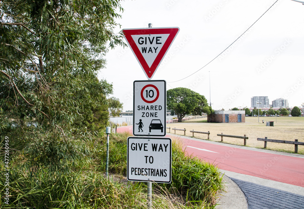 Traffic warning signs for give way, shared zone speed limit 10 km/hr ...