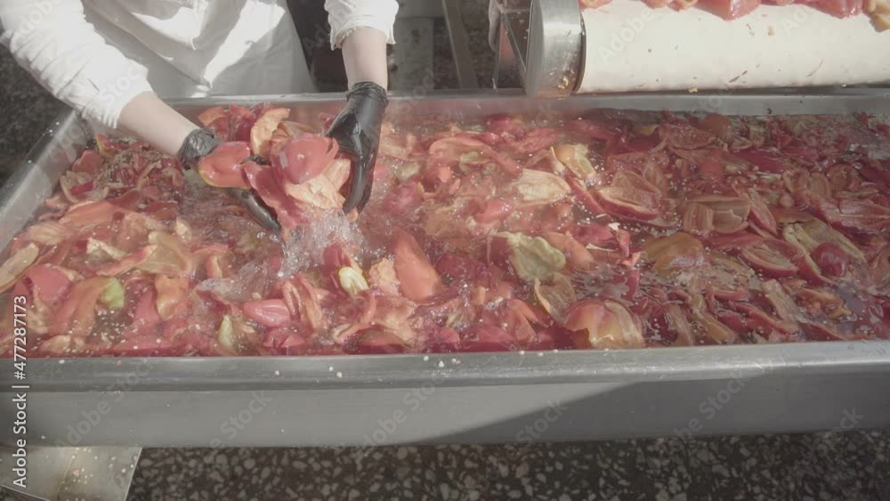 Fresh chopped red Peppers. The process of washing Peppers in a ...