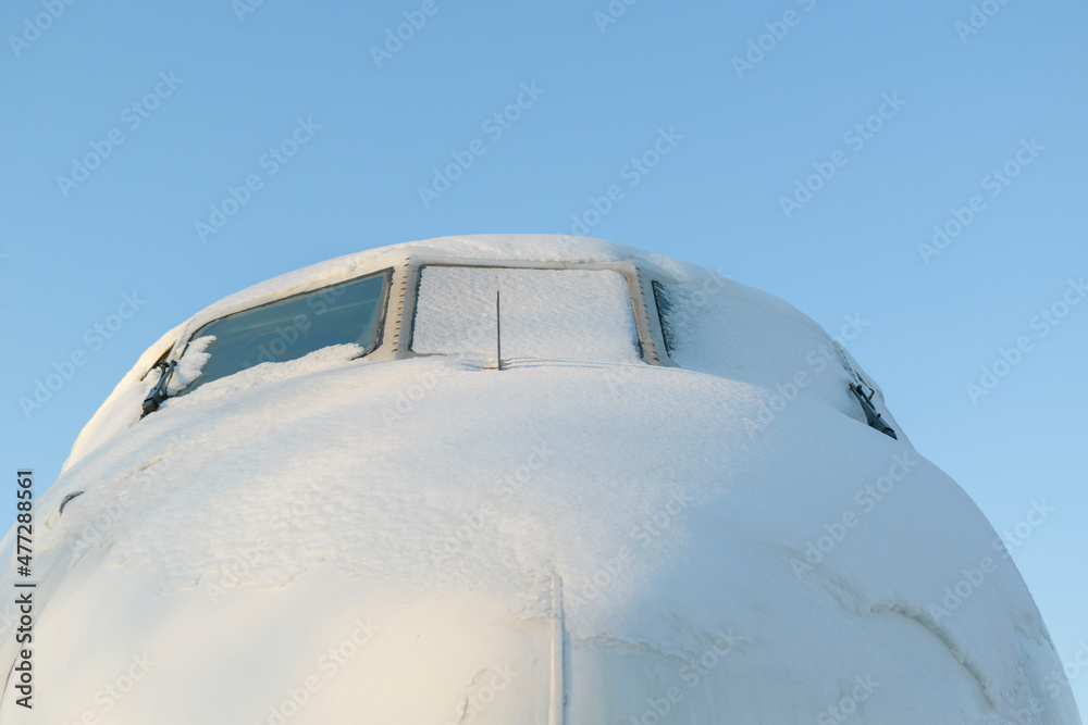Aircraft fuselage against the sky. Body of cabin and the windows are ...