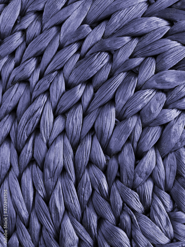 Banana leaf braids in Very Peri color of the year. Wicker background ...