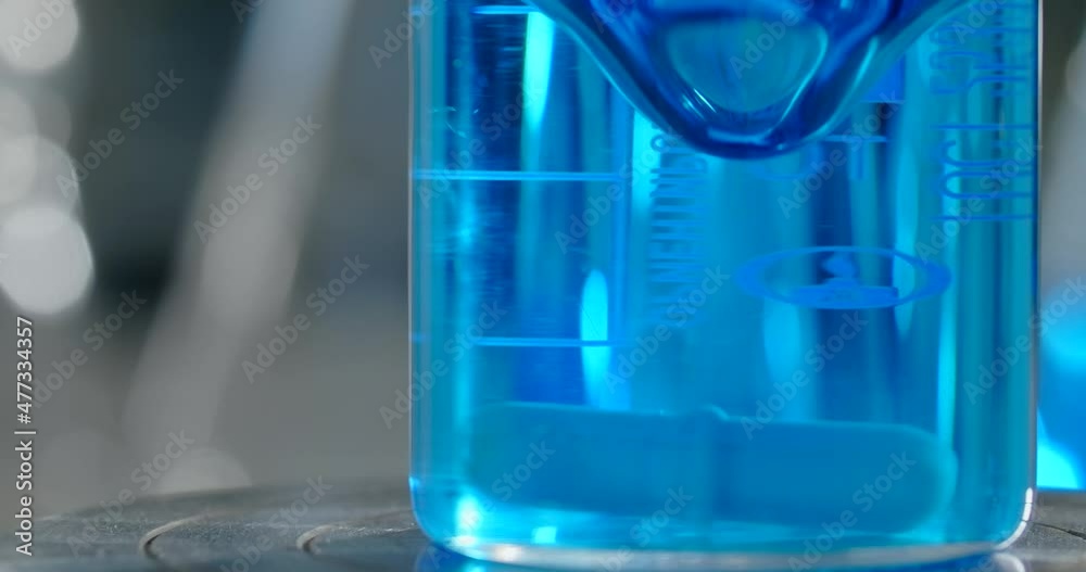 Inside the chemical laboratory: mixing liquid drugs by laboratory ...