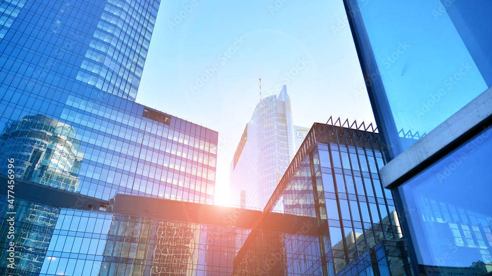 Commercial building close up in blue tone. Gigantic skyscraper from ...