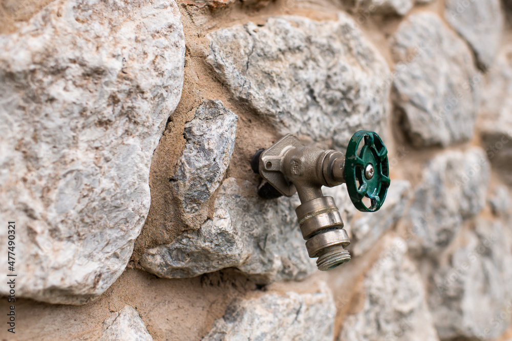 A Water Spicket Rock Wall Spicket on the Rock Home House Old Useful ...