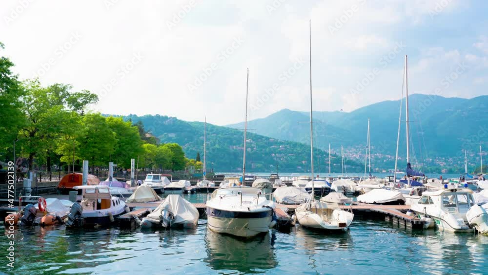 Port of Como (harbour) and lakefront. Como is a tourist destination on ...