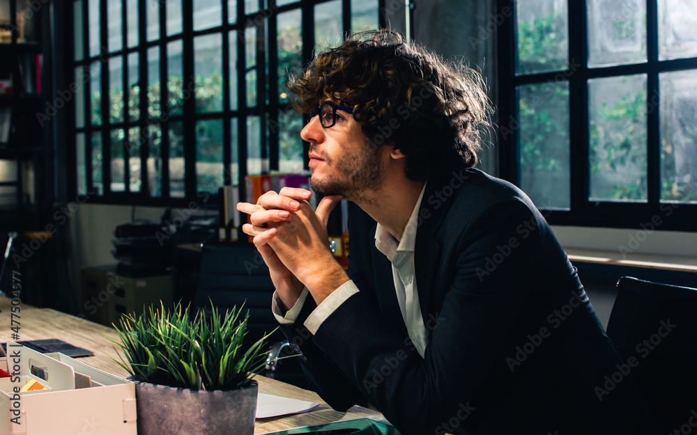 Handsome smart hipster Caucasian businessman with curly hair wearing ...