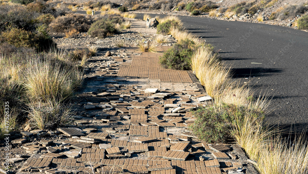 rubble and garbage thrown and abandoned on the street in a vacant lot ...