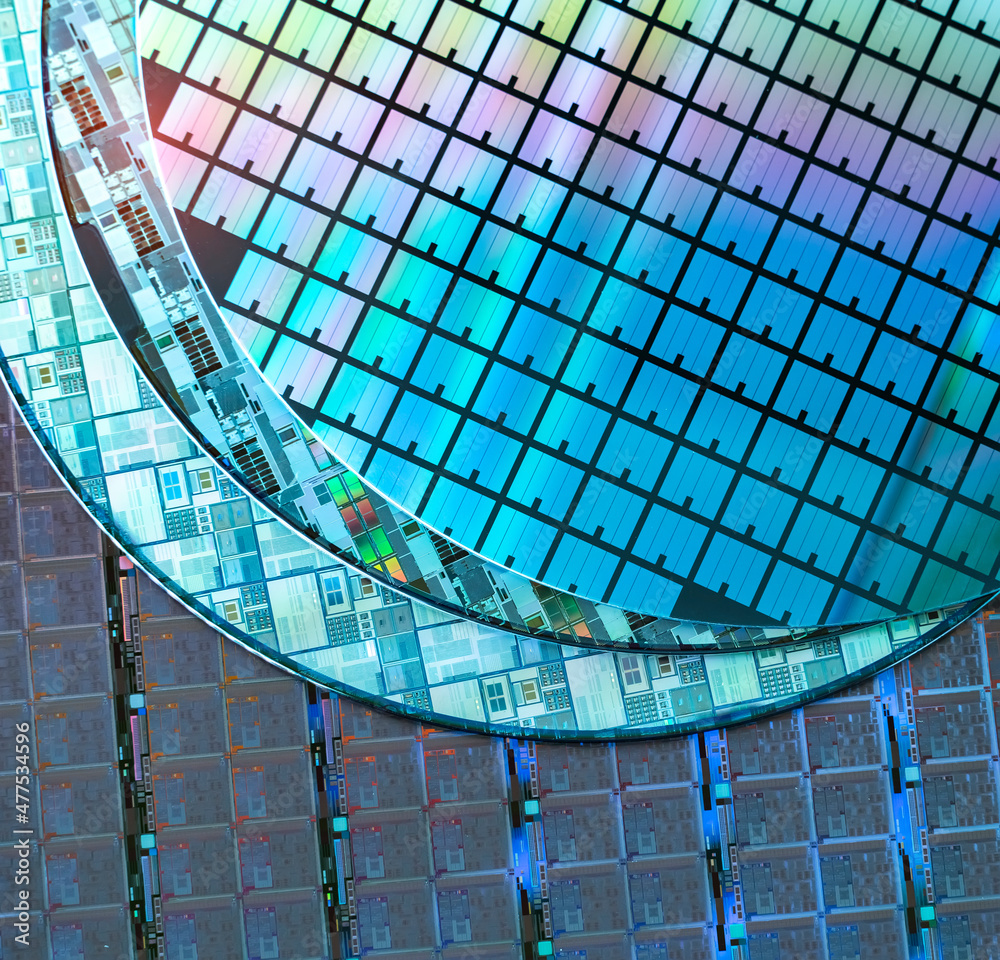 Silicon Wafer with microchips used in electronics for the fabrication ...