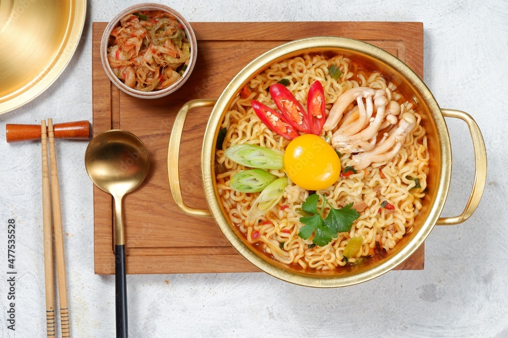 Serving a Korean style instant noodle, Ramyeon or Ramyun with spicy ...