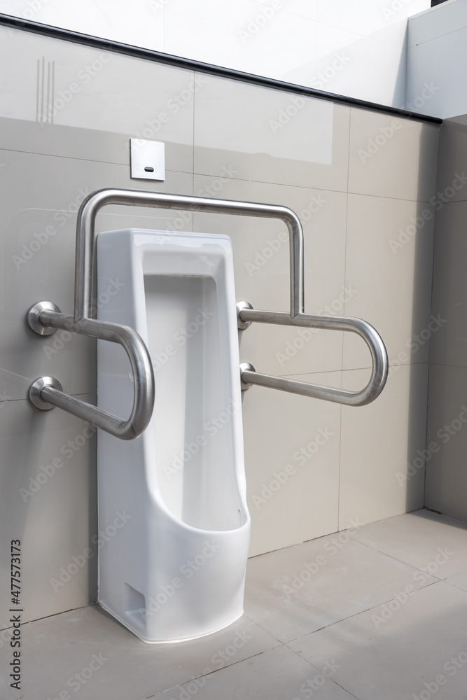 Public disabled toilet in a large building. Modern restroom for ...