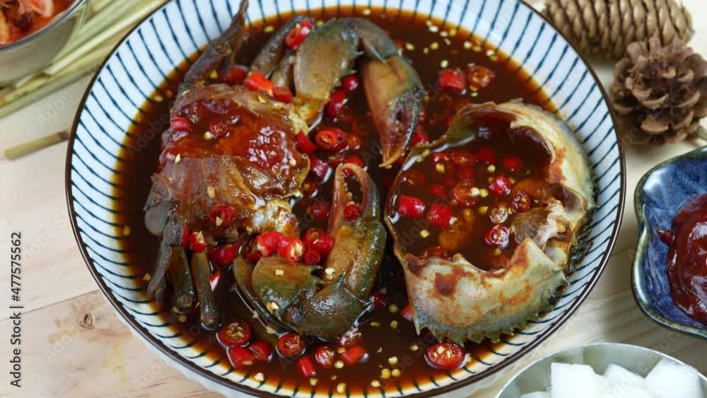 Korean spicy Fresh raw crabs marinated in a mild soy sauce, Ganjang ...