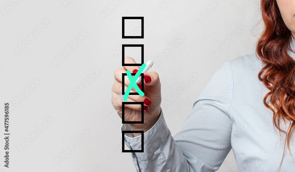 Marking on checklist box. Person ticking checkboxes with pen on ... Marking on checklist box. Person ticking checkboxes with pen on ...