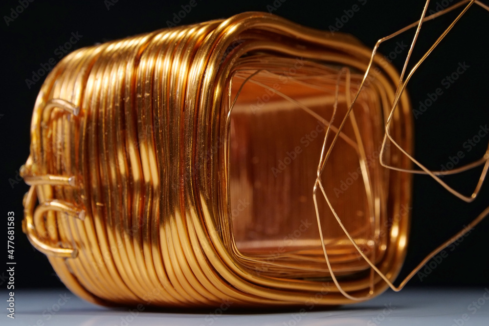 Copper winding of step-down single-phase transformer, chemical element ...
