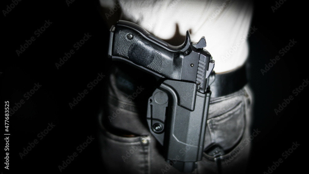 Man openly carrying a pistol on his belt. Open carry and second ...