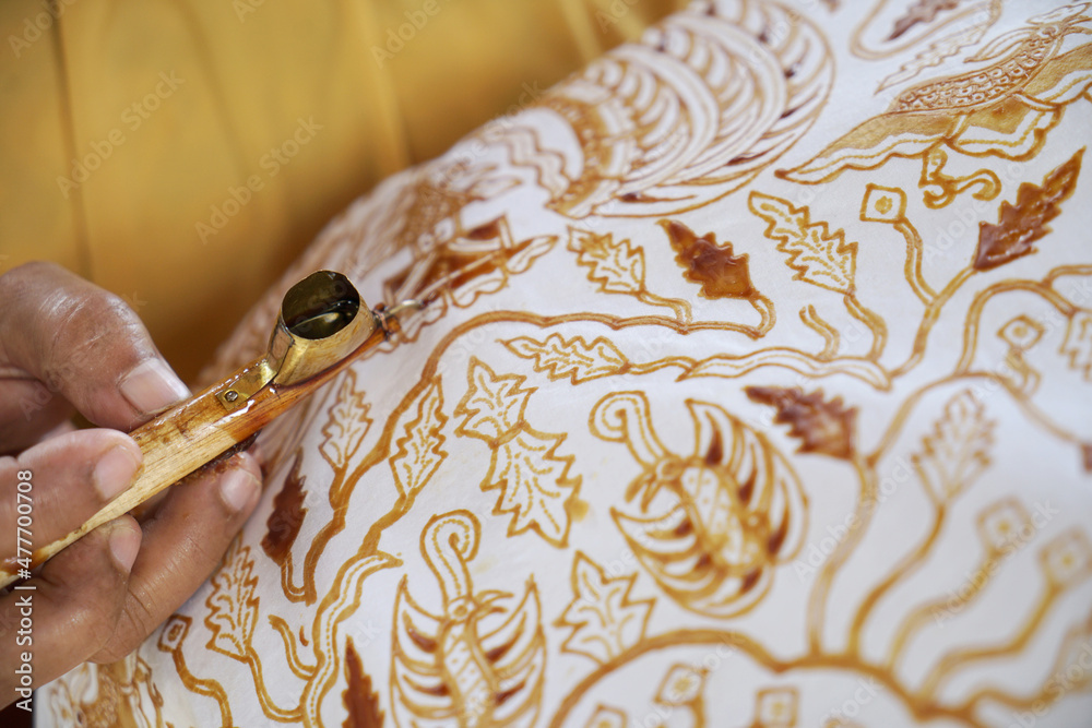The process of making batik. batik is a handmade traditional art ...