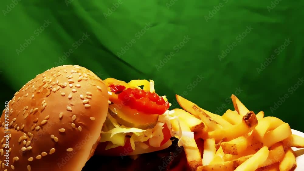 burger combo fries closeup reveal rotating on a white oval plate at 360 ...
