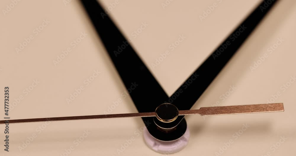 close up of modern Wall clock showing running time pointer, with ...