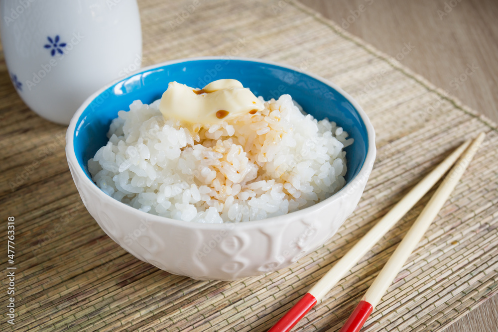 Japanese Uruchimai steamed rice with a knob of butter and soy sauce in ...
