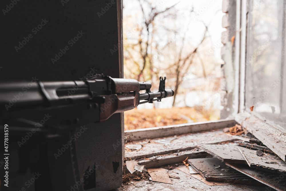 Kalashnikov assault rifle. armed ambush, guerrilla warfare. urban war ...