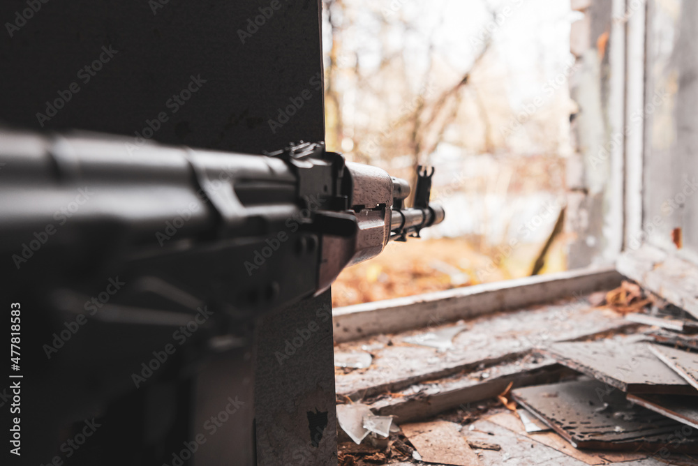 Kalashnikov assault rifle. armed ambush, guerrilla warfare. urban war ...