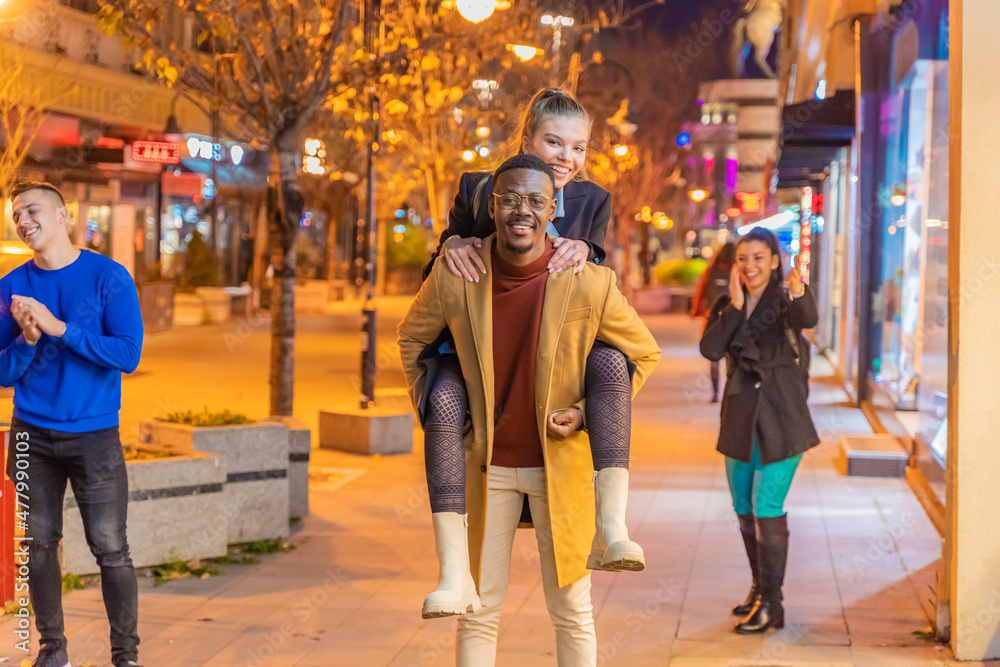 Piggyback ride while posing Stock Photo | Adobe Stock