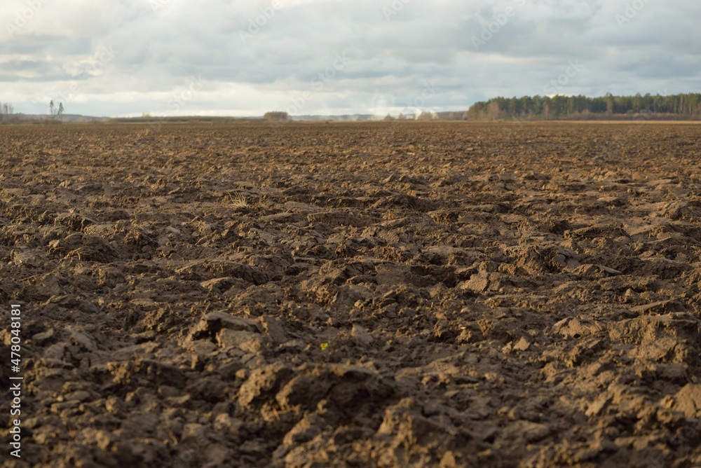 Agricultural plowed field, soil texture. Farm and food industry ...