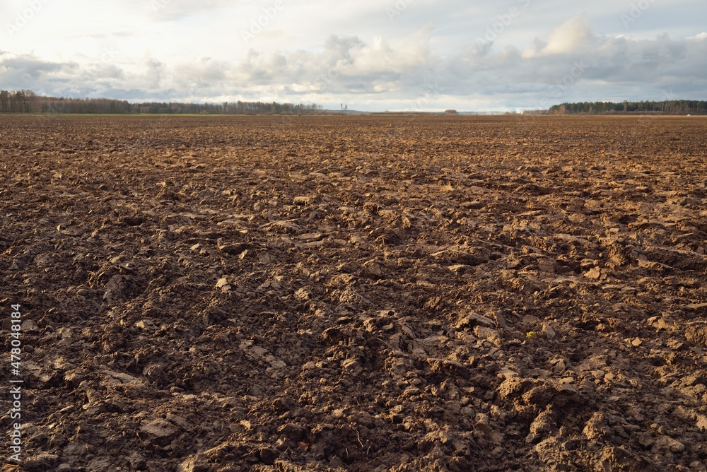 Agricultural plowed field, soil texture. Farm and food industry ...