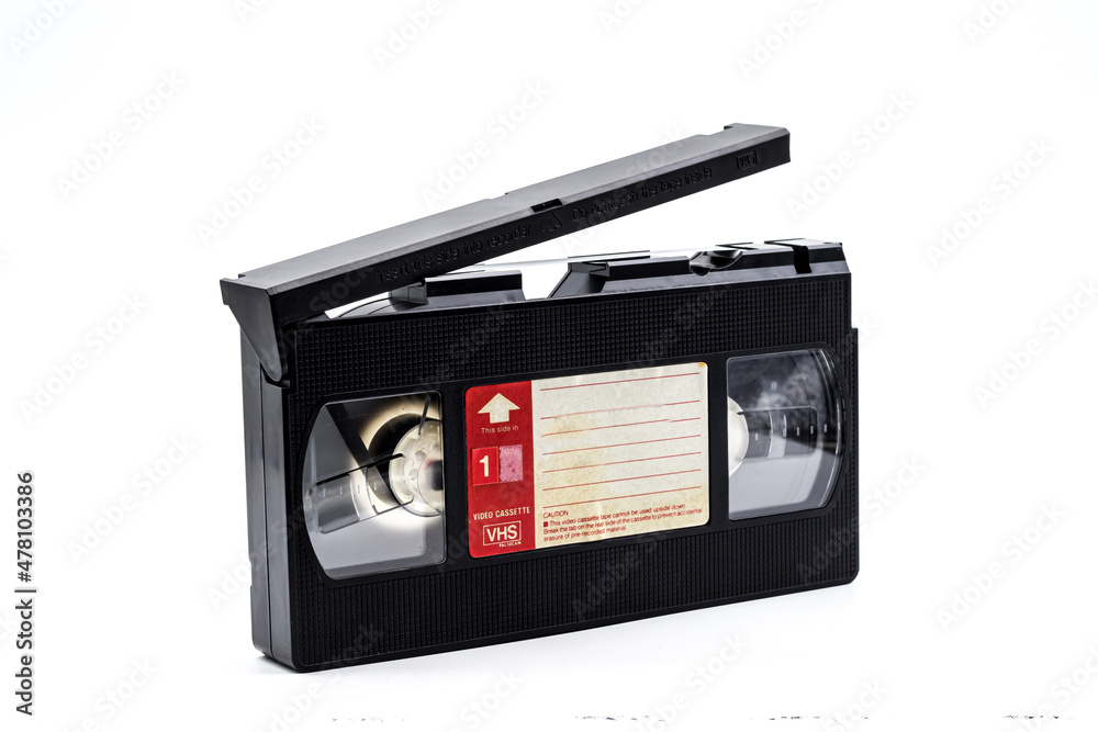 Old VHS cassette with broken tape cover isolated on white Stock Photo ...