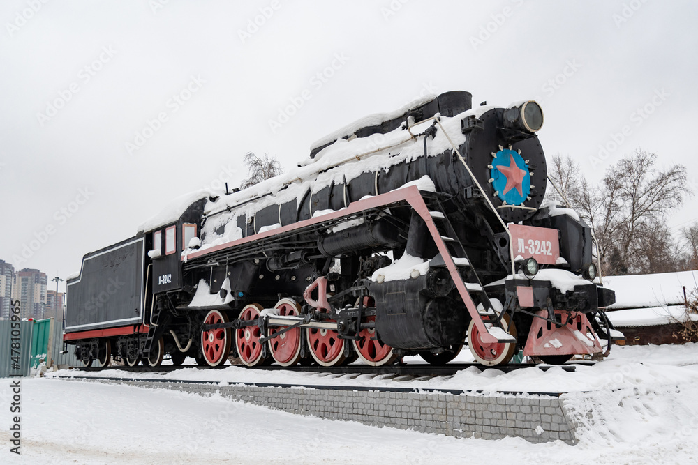 NOVOSIBIRSK, RUSSIA-25 December 2021: Steam locomotive L is a Soviet ...