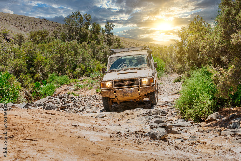 Off roading with an all terrain vehicle through a dry riverbed in The ...