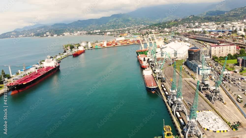 Container ship loading and unloading in deep sea port, Aerial view of ...