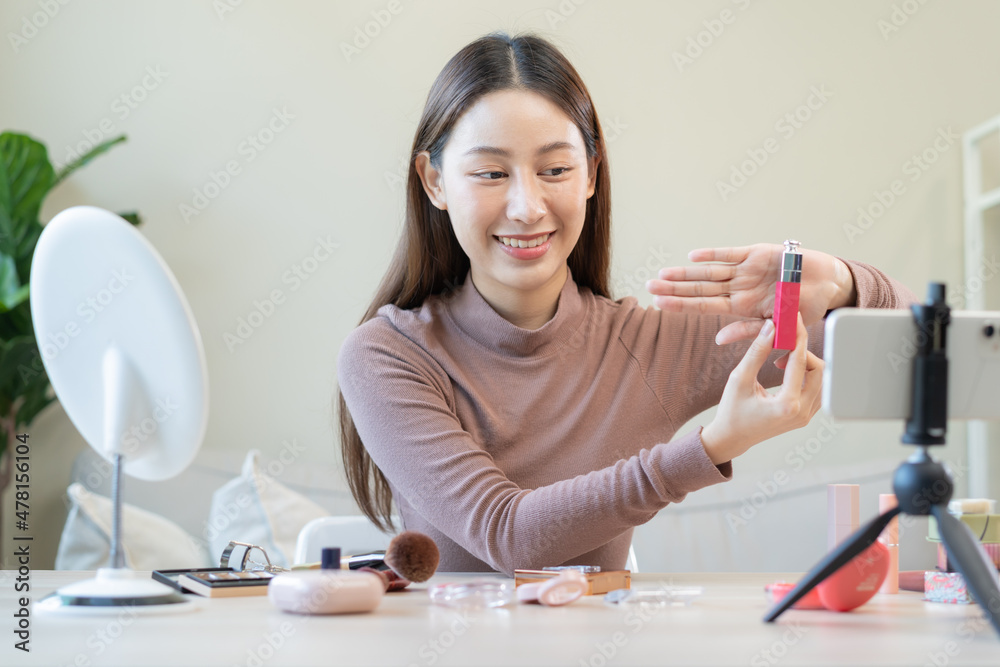 Beauty blogger, asian young woman, girl vlogger makeup face, showing ...