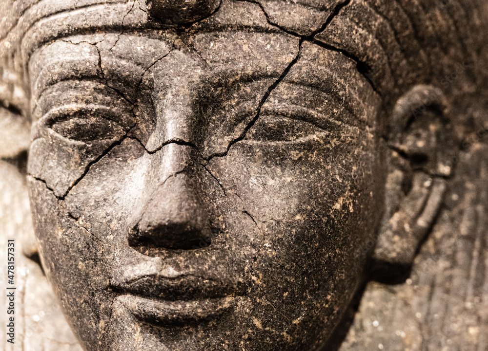 Cracks in the stone face of an ancient Egyptian statue Stock Photo ...