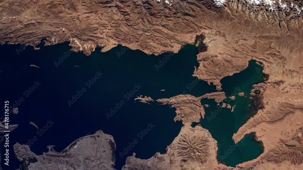 Scenic view of lake and mountains of Titicaca lake south America Peru ...