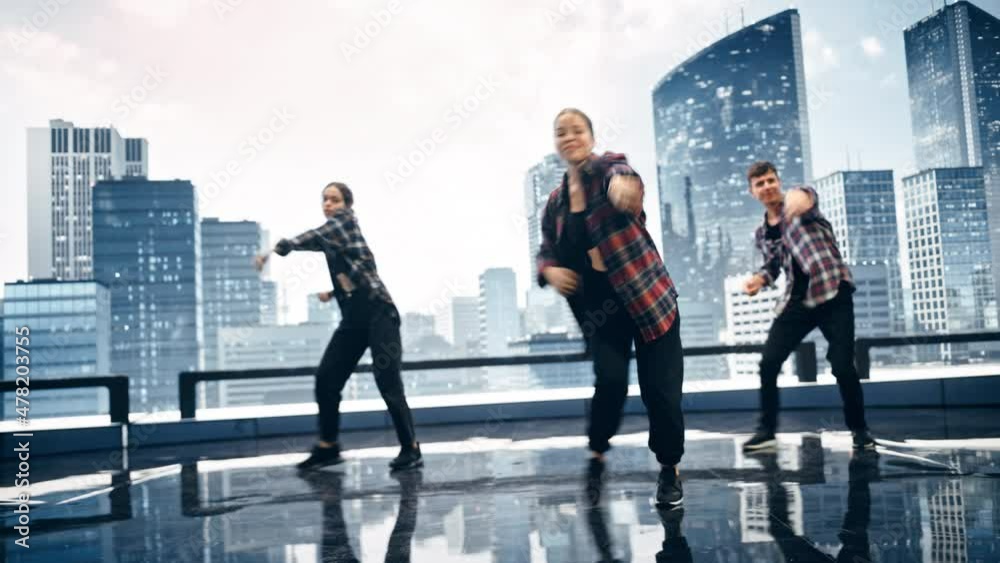 Diverse Group of Three Professional Dancers Performing a Hip Hop Dance ...