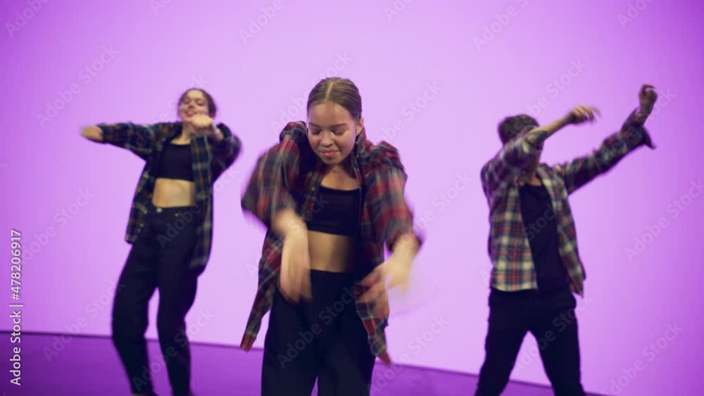 Diverse Group of Three Young Professional Dancers Performing a Hip Hop ...