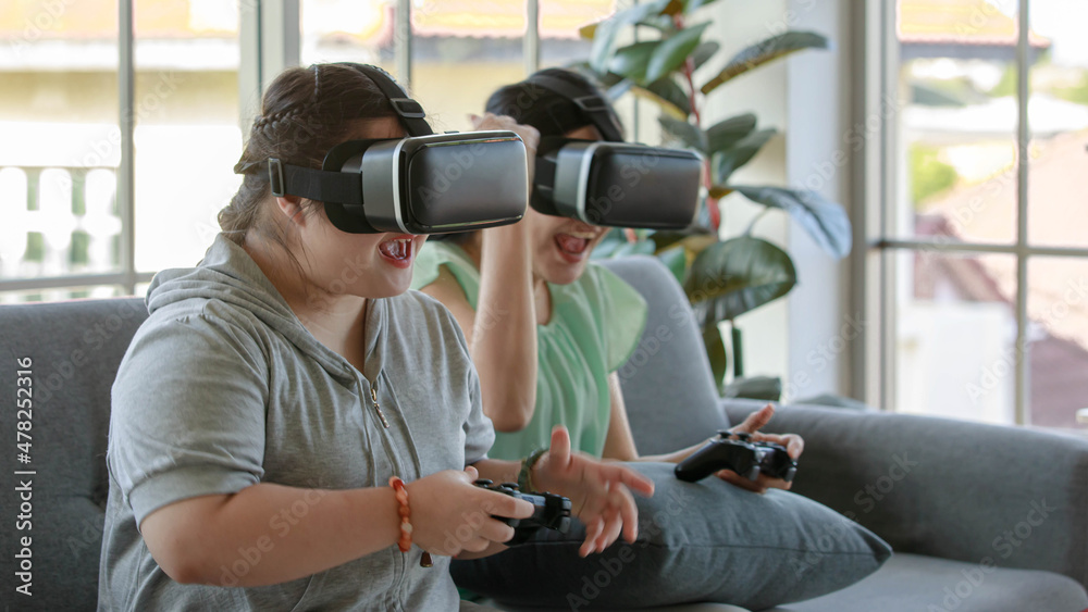 Asian happy lovely mother and young chubby down syndrome autistic ...