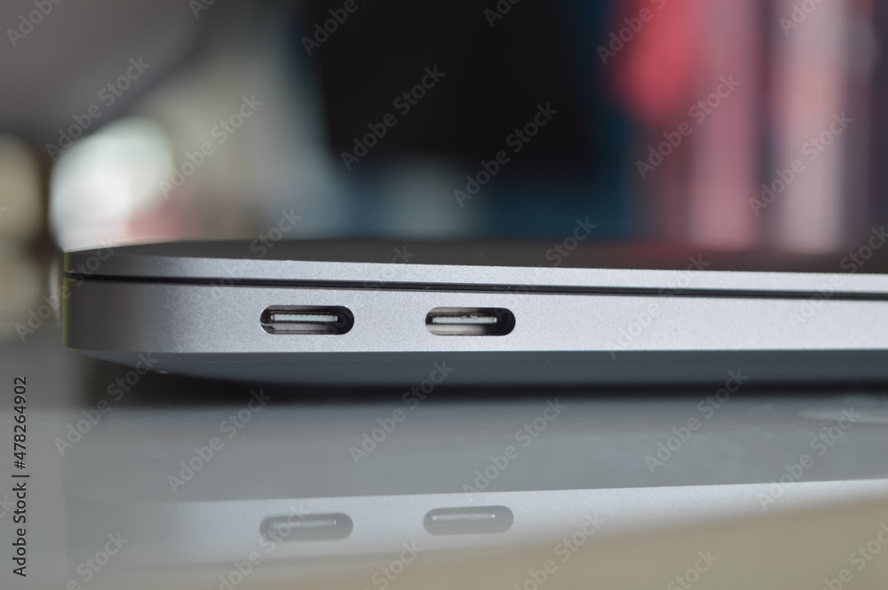 Modern laptop with type C charging port Stock-Foto | Adobe Stock