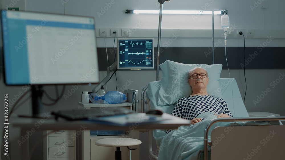 Ill patient in hospital ward getting healing treatment at medical ...