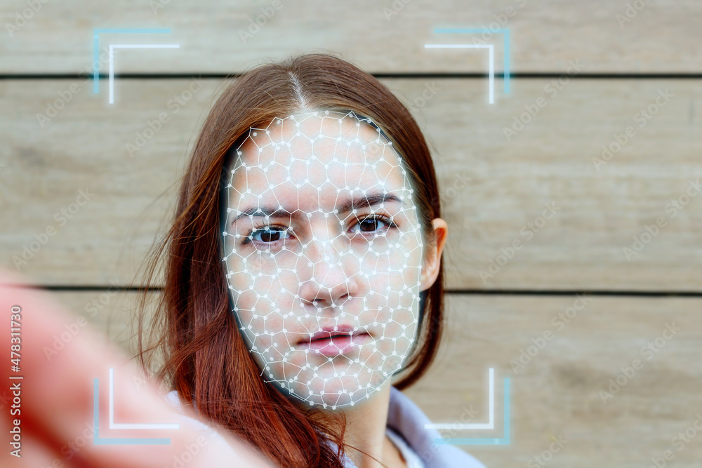 Young woman face during ai authentication biometrics. Stock Photo ...