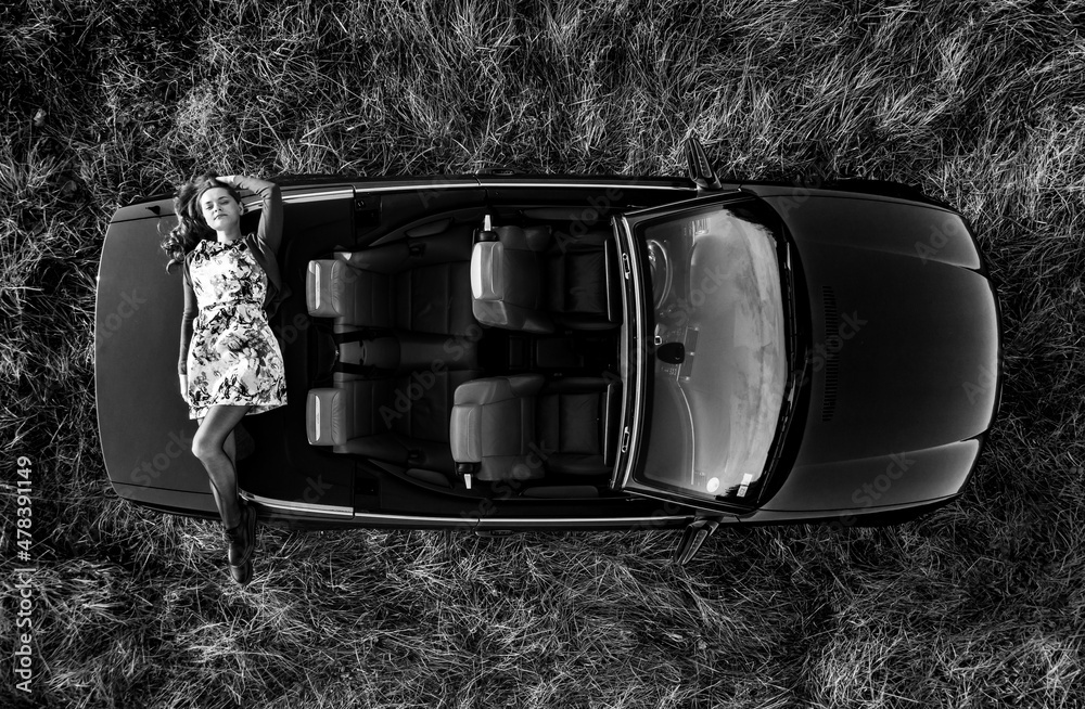Beautiful girl and retro convertible, top view with drone Stock Photo ...