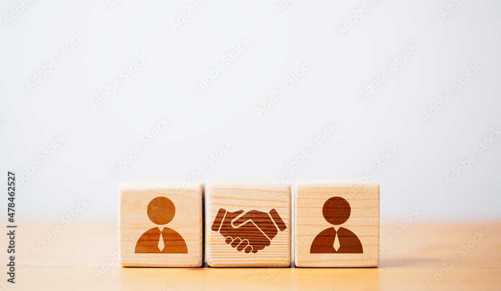 Drawing of hand shaking which print screen on wooden cube block in ...